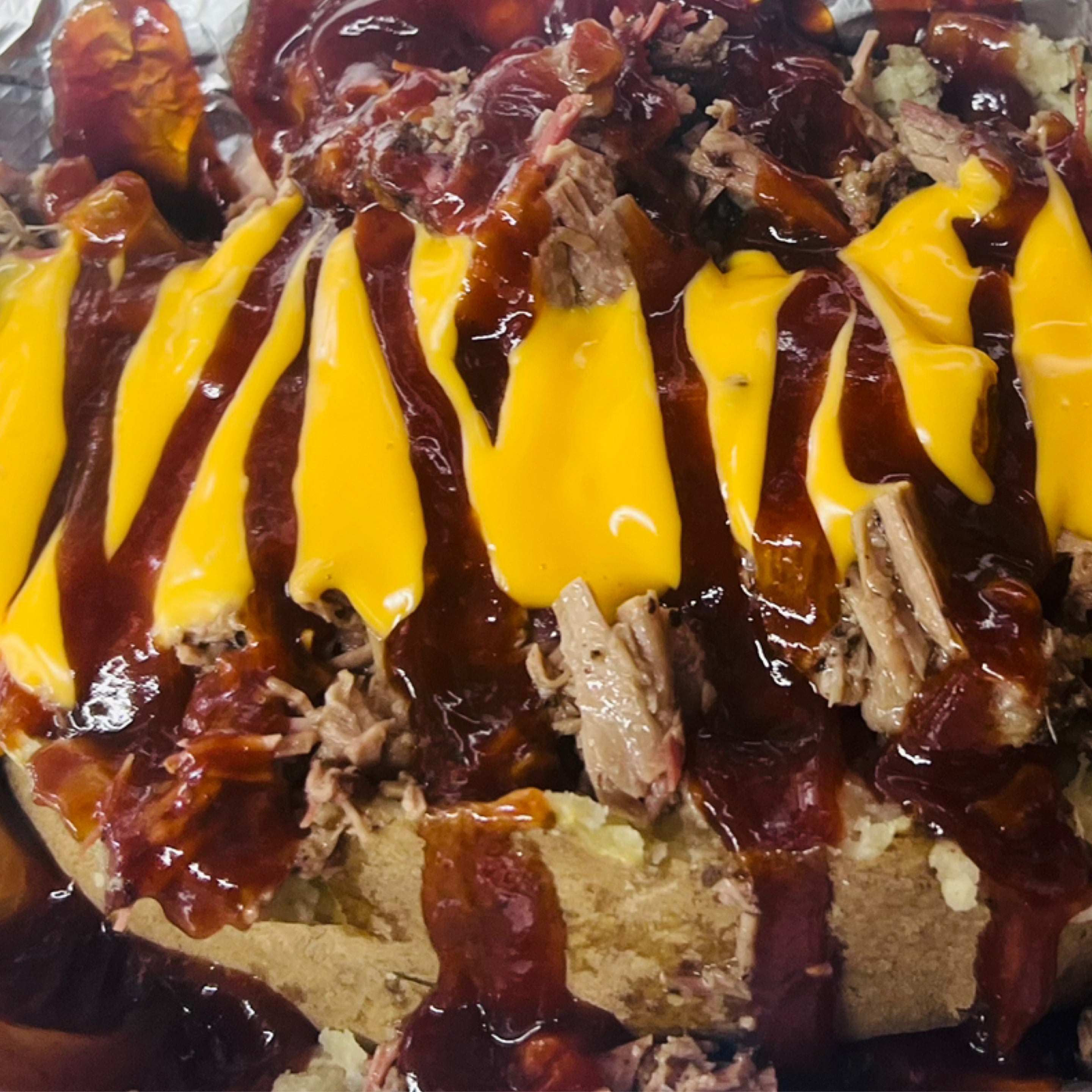 SOPHIA’S JUMBO BRISKET LOADED POTATO | Norah's Smokehouse